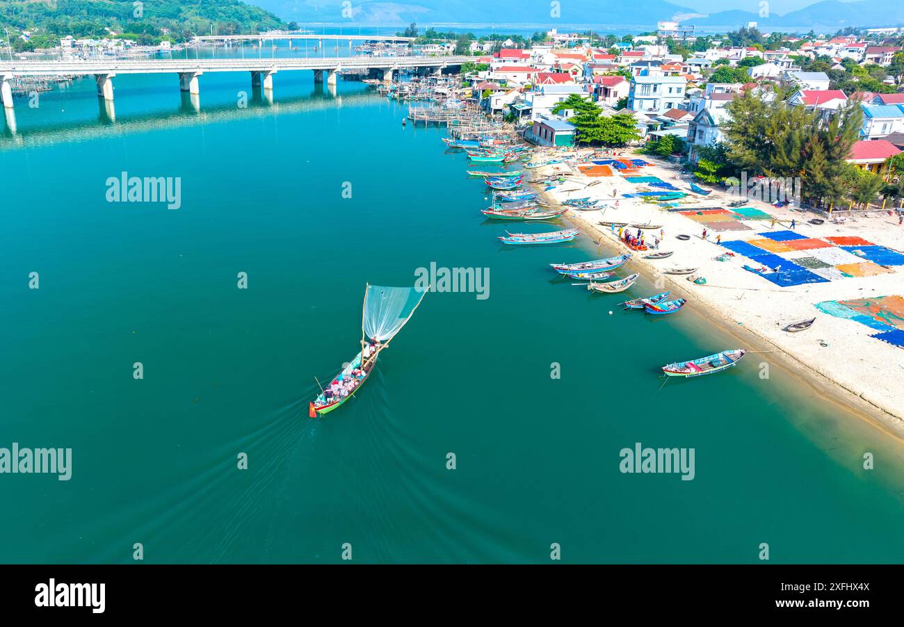 Lang Co Bay, Hue, Vietnam in the morning with a small fishing village ...