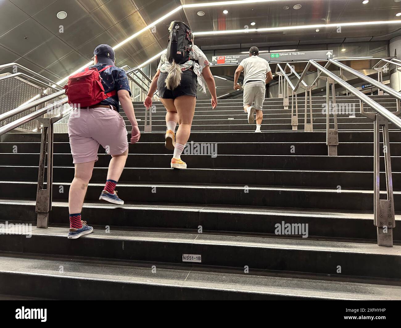 Commuters exiting Fulton Street Subway Station near The World Trade ...