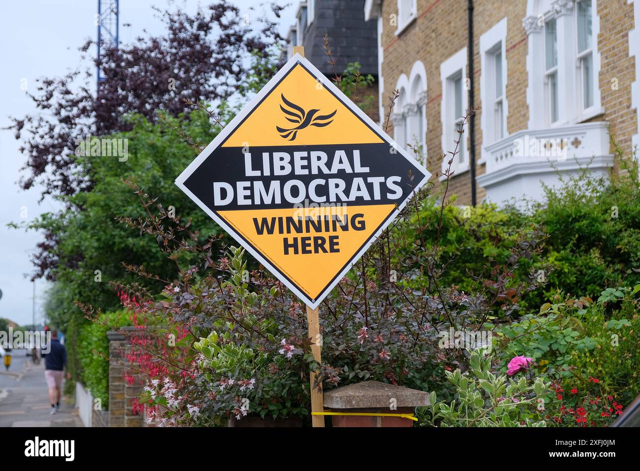 A Liberal Democrats diamond poster board outside a home in Wimbledon ...