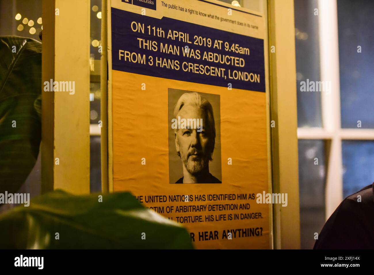 Poster with Julian Assange is seen during the celebration of a Birthday ...