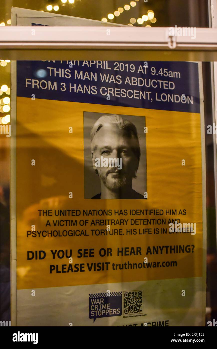 Poster with Julian Assange is seen during the celebration of a Birthday ...