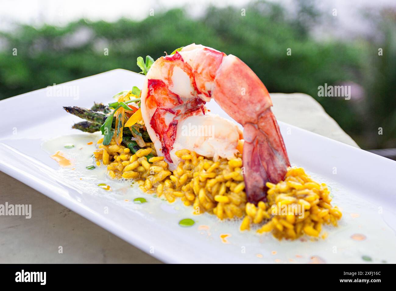 Bali, Indonesia - 12 October 2011: Shrimp with yellow rice Stock Photo ...