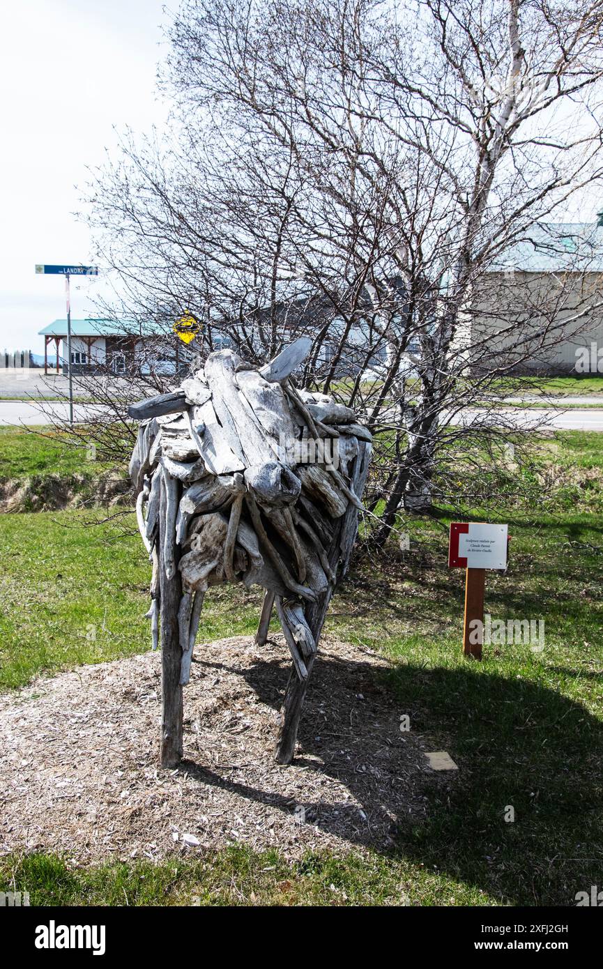 Wooden sculpture of a cow at La Ferme Gilles Landry dairy farm on QC ...