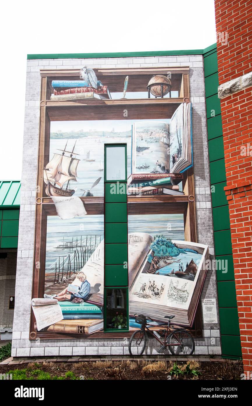 Woman reading a book in a wooden bookshelf mural on the Lauréat ...
