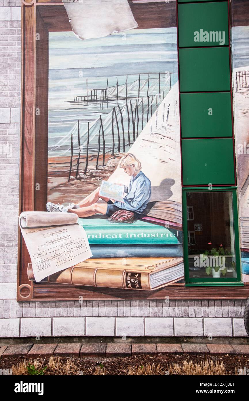 Woman reading a book in a wooden bookshelf mural on the Lauréat ...