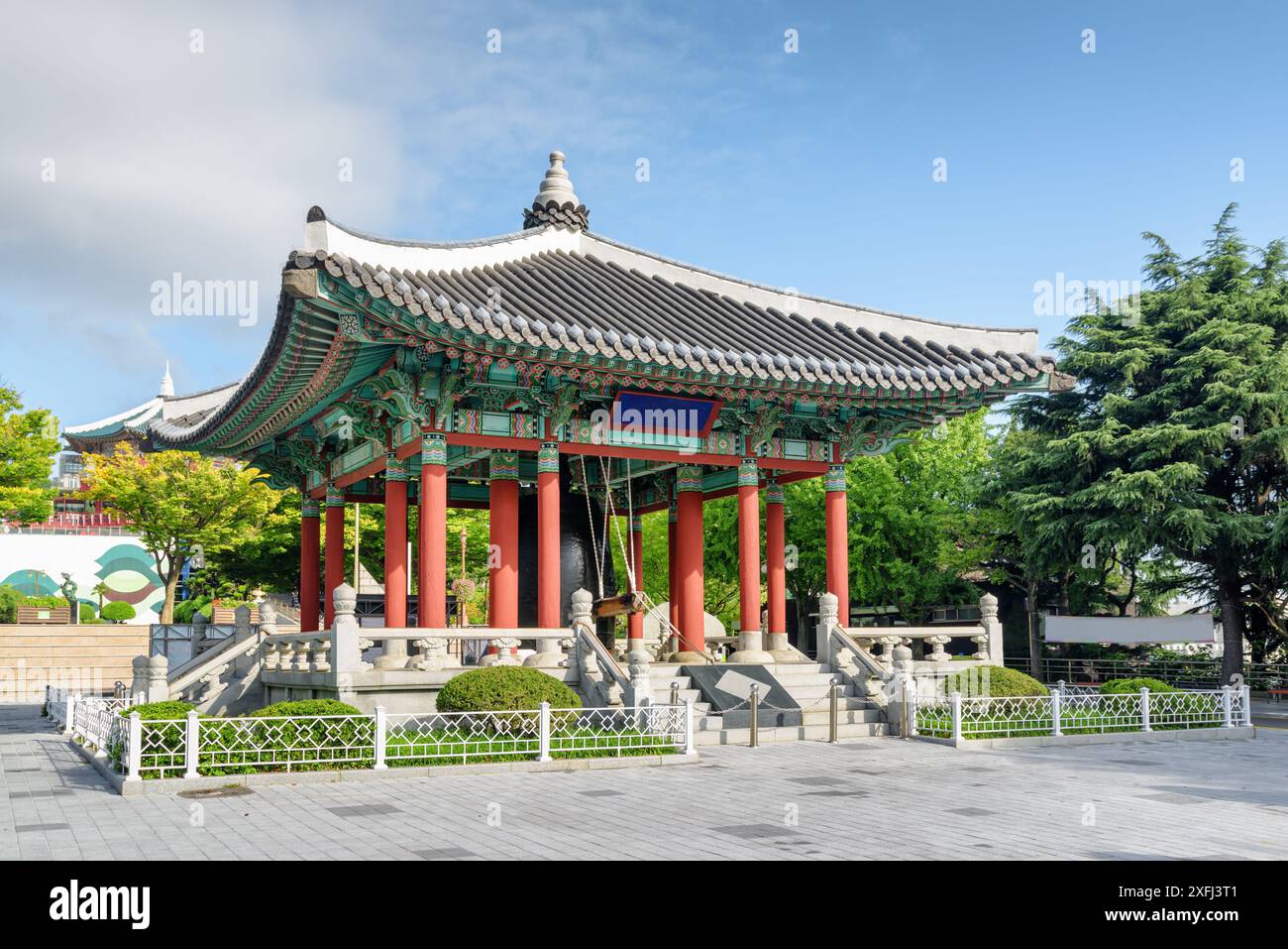 Colorful bell pavilion of traditional Korean architecture on blue sky ...