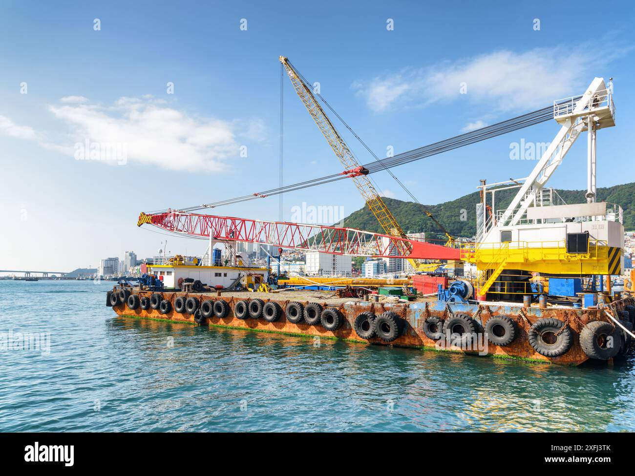 Crane vessel on blue sky background at the Port of Busan in South Korea ...