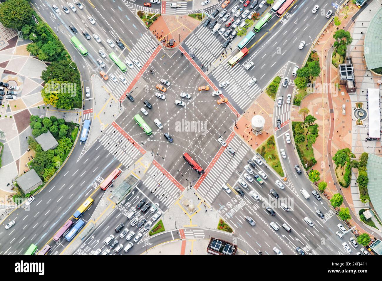 Amazing top view of road intersection at downtown of Seoul in South Korea. Cars and colorful ...