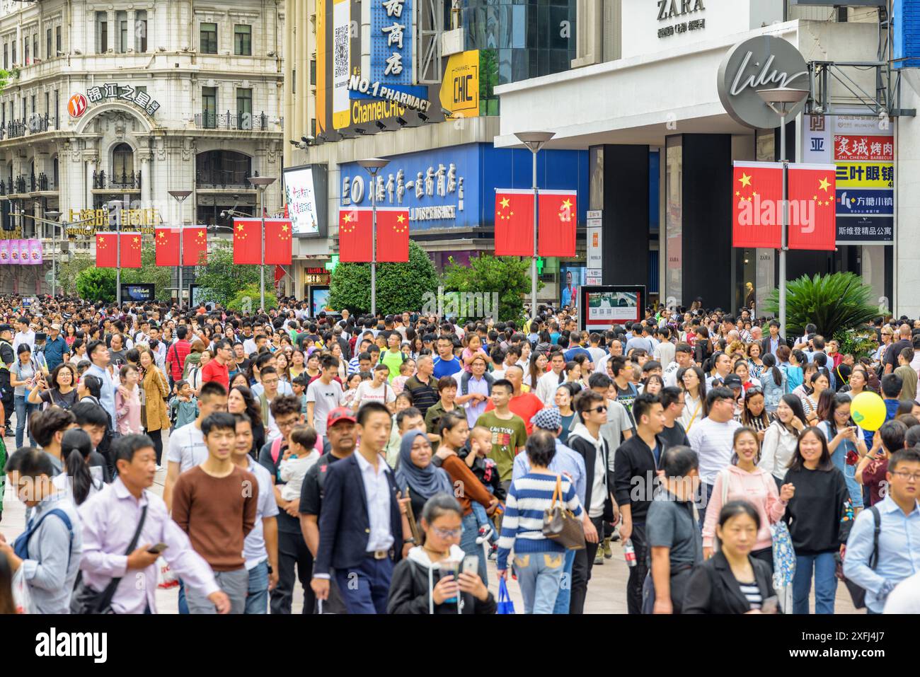Shanghai, China - October 3, 2017: Crowd on Nanjing Road at downtown of ...