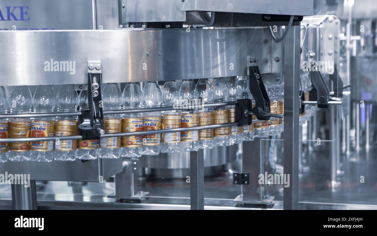Bangkok, Thailand - June 15, 2024: Automatic foods liquid filling ...