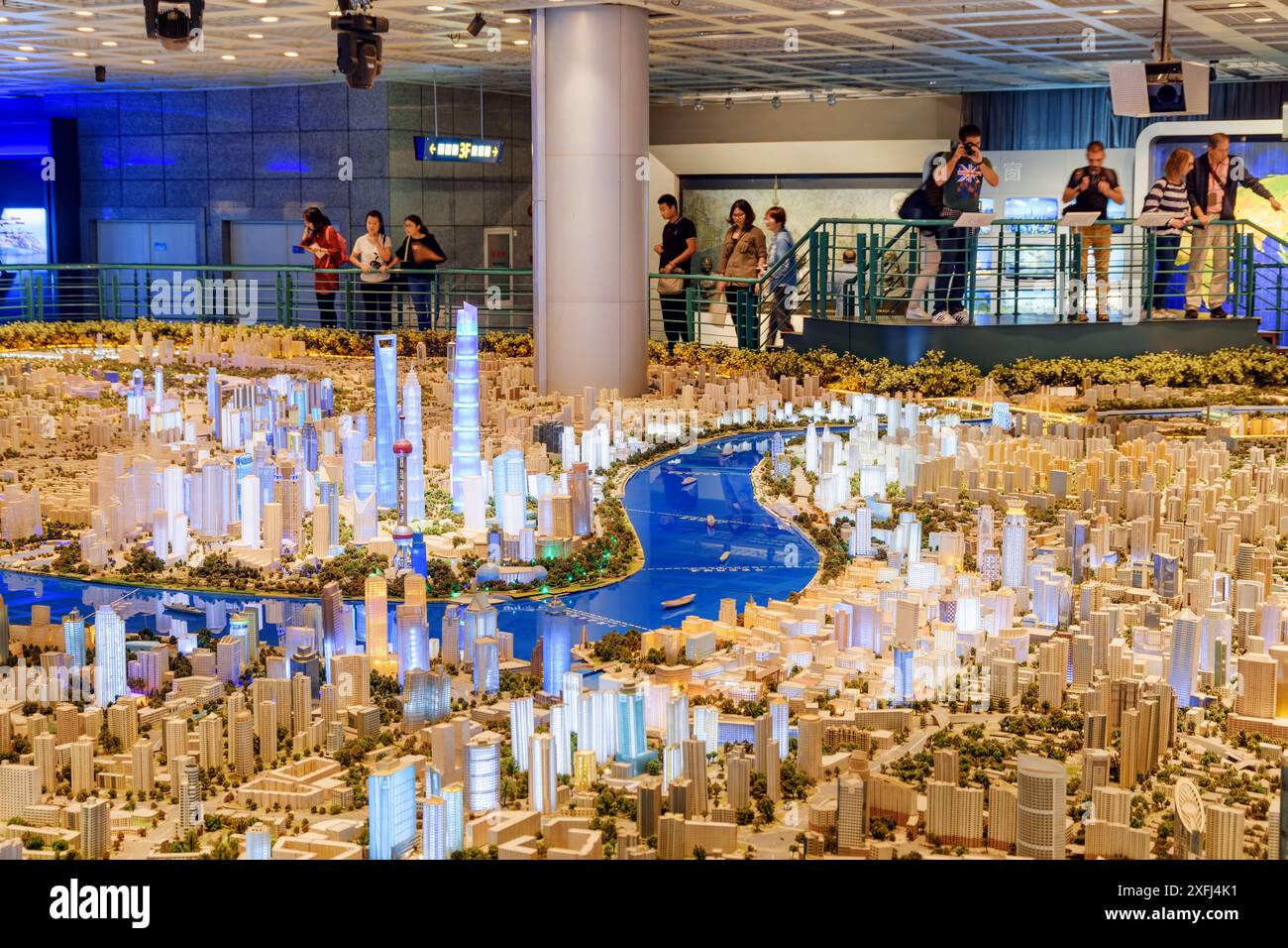 Shanghai, China - October 3, 2017: Visitors viewing a huge scale model ...