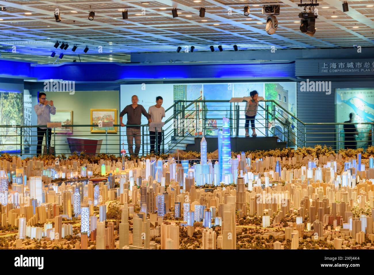 Shanghai, China - October 3, 2017: Visitors viewing a huge scale model ...