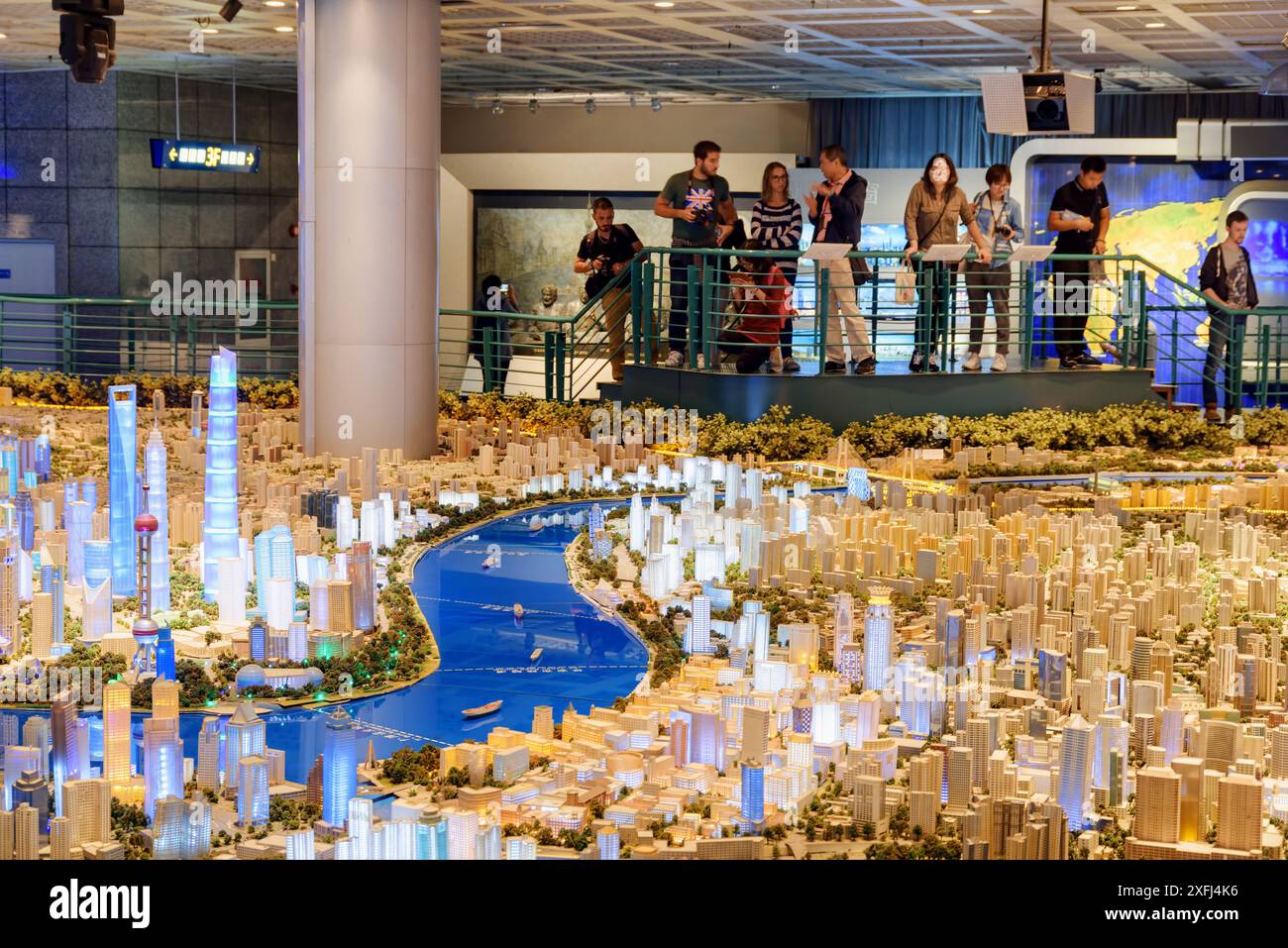Shanghai, China - October 3, 2017: Visitors viewing a huge scale model ...