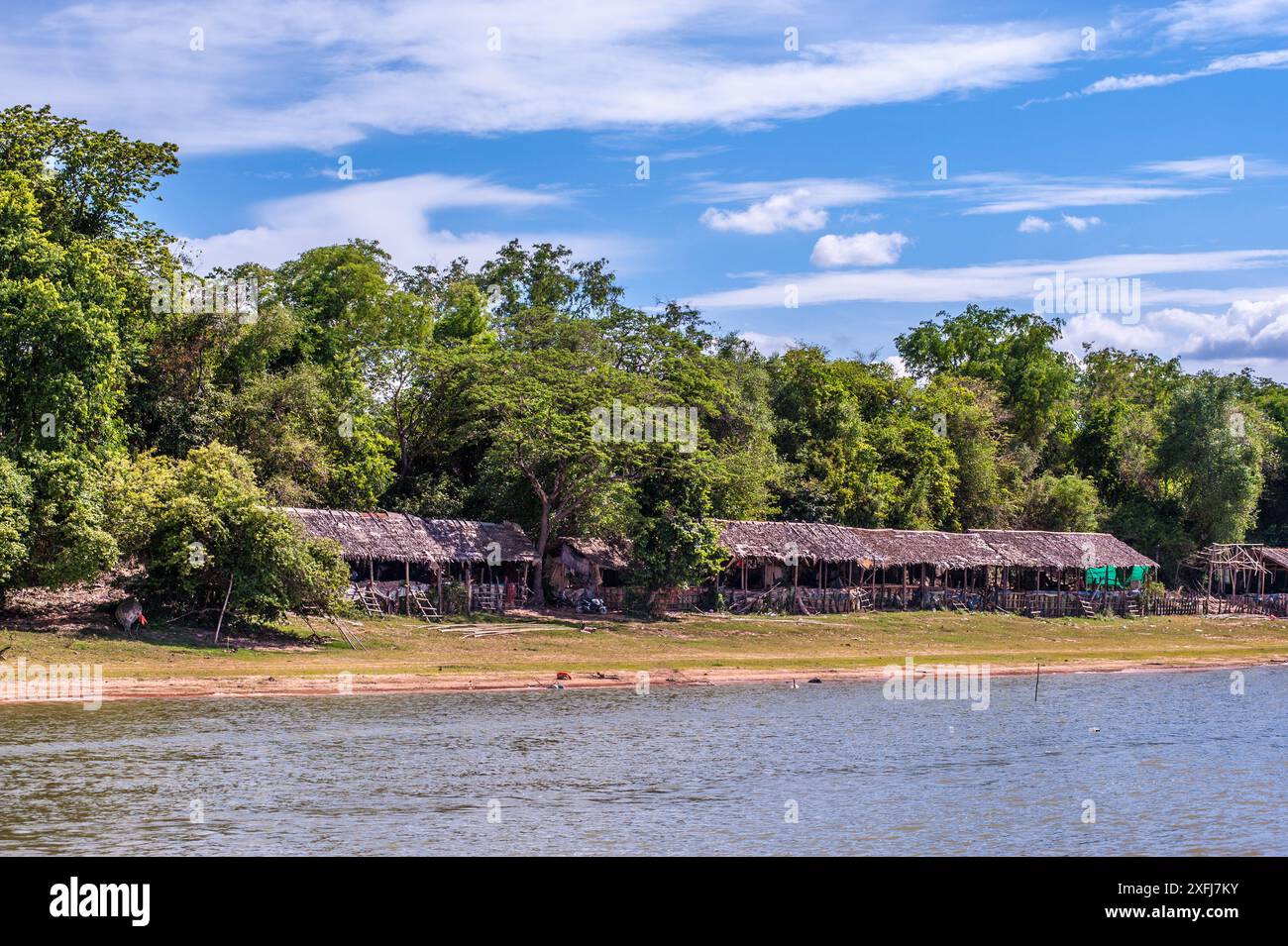 Thatched roof huts on the West Baray Reservoir. Angkor Archaeological ...