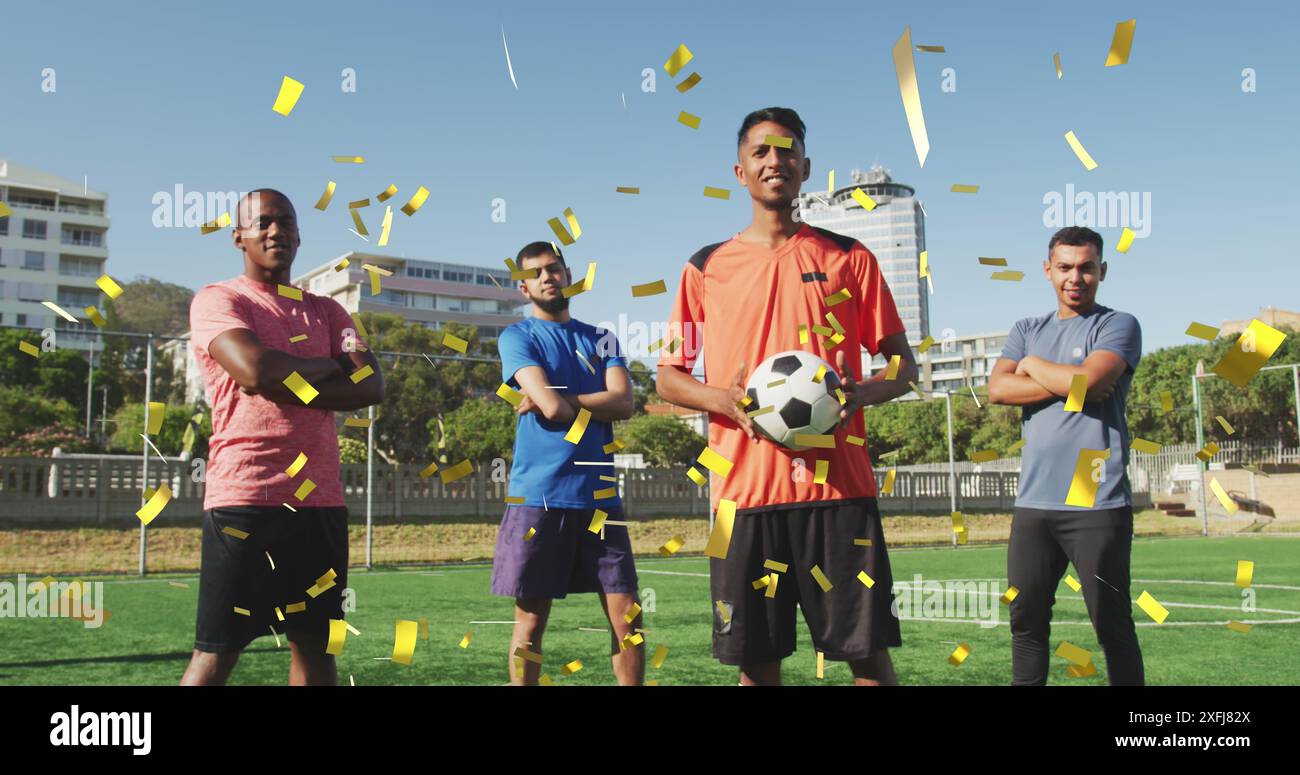 Image of confetti falling over portrait of male football team on pitch ...