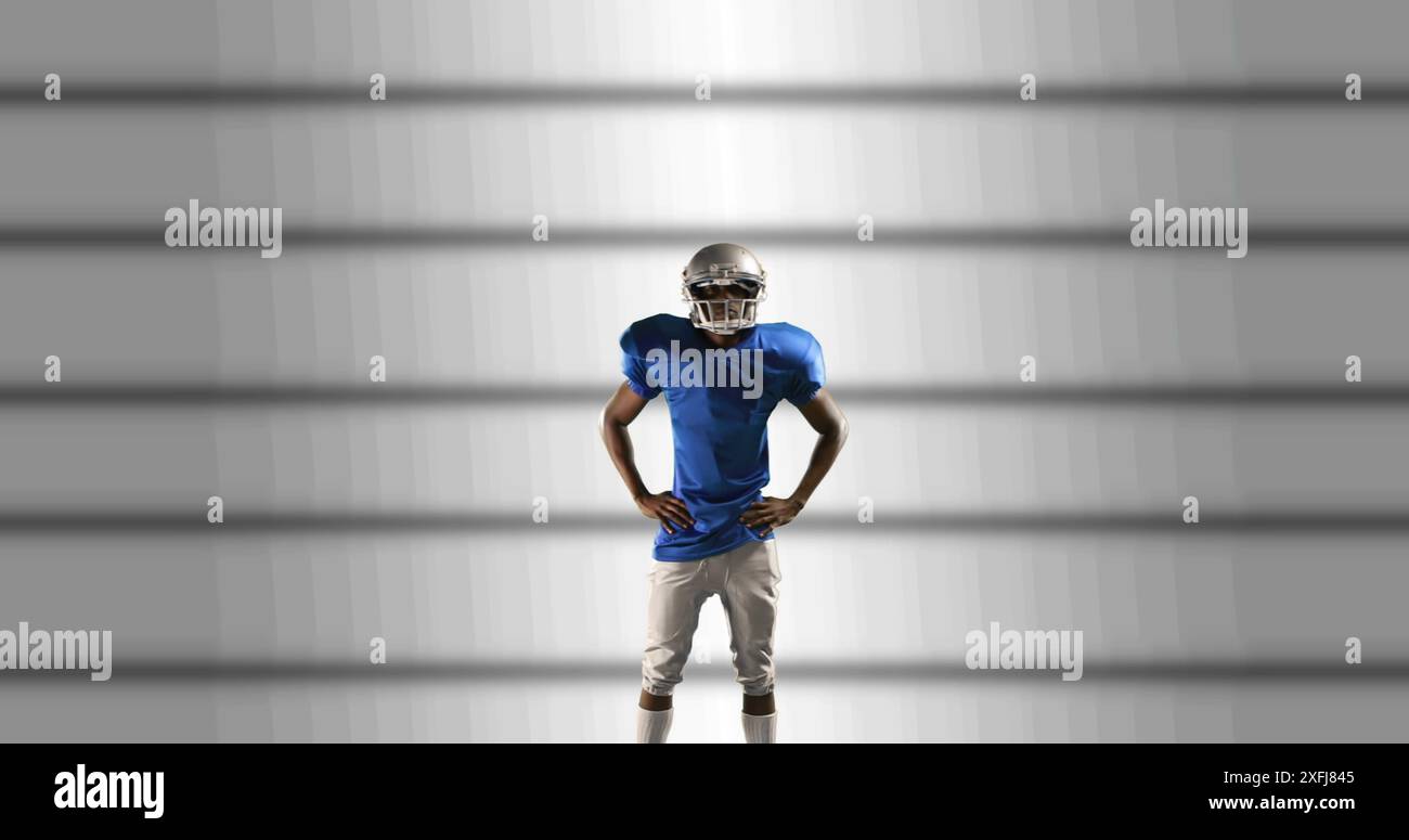 Male rugby player wearing helmet celebrating against stripes on grey ...