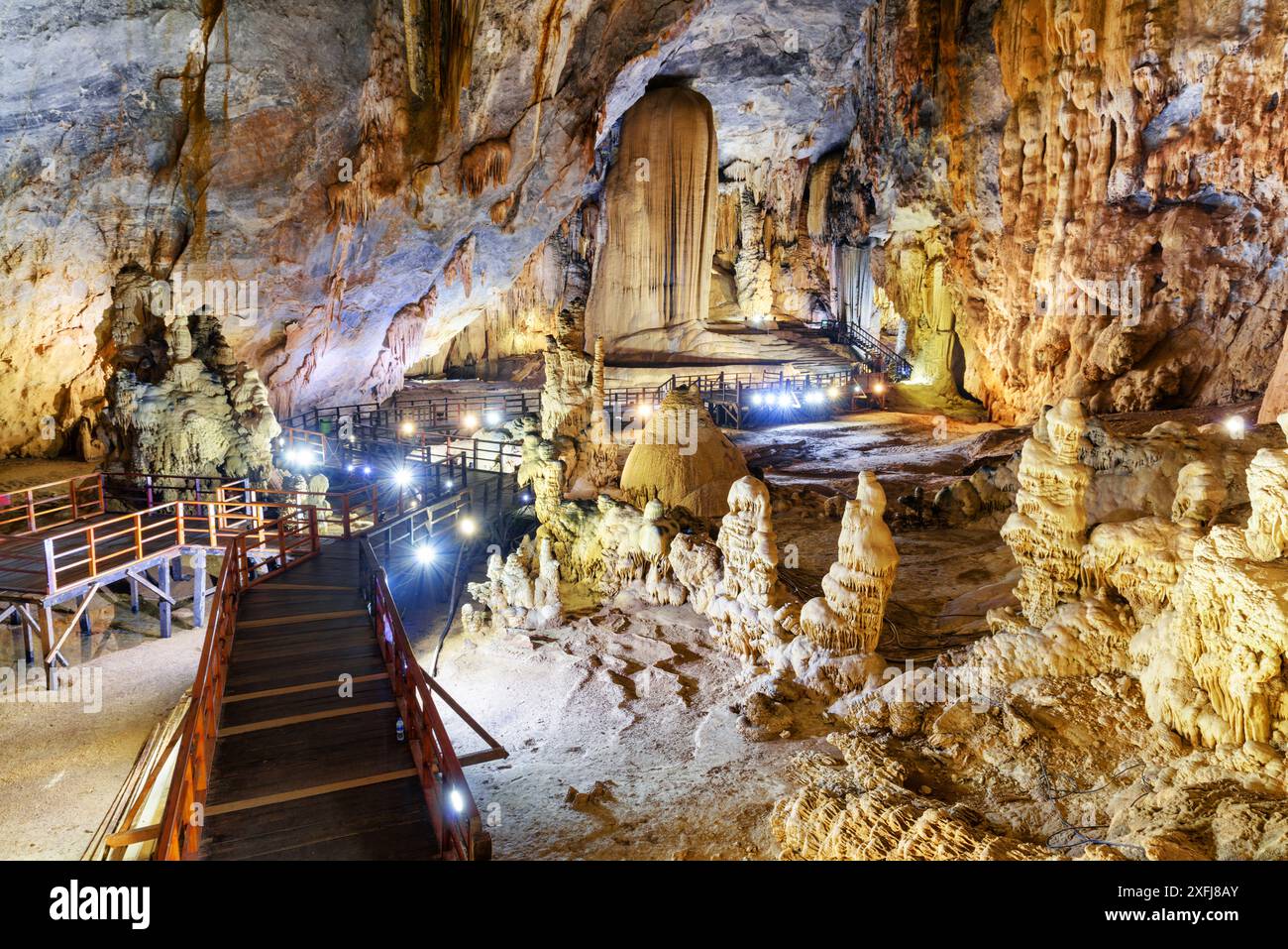 Wooden walkway through natural underground corridor inside Paradise ...