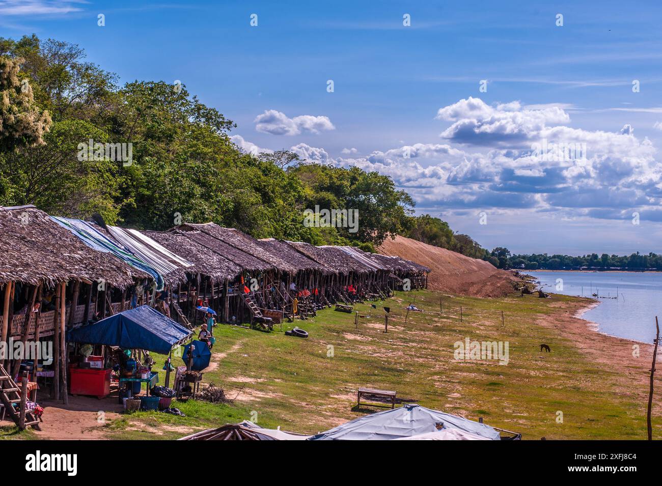 Thatched roof huts on the West Baray Reservoir. Angkor Archaeological ...