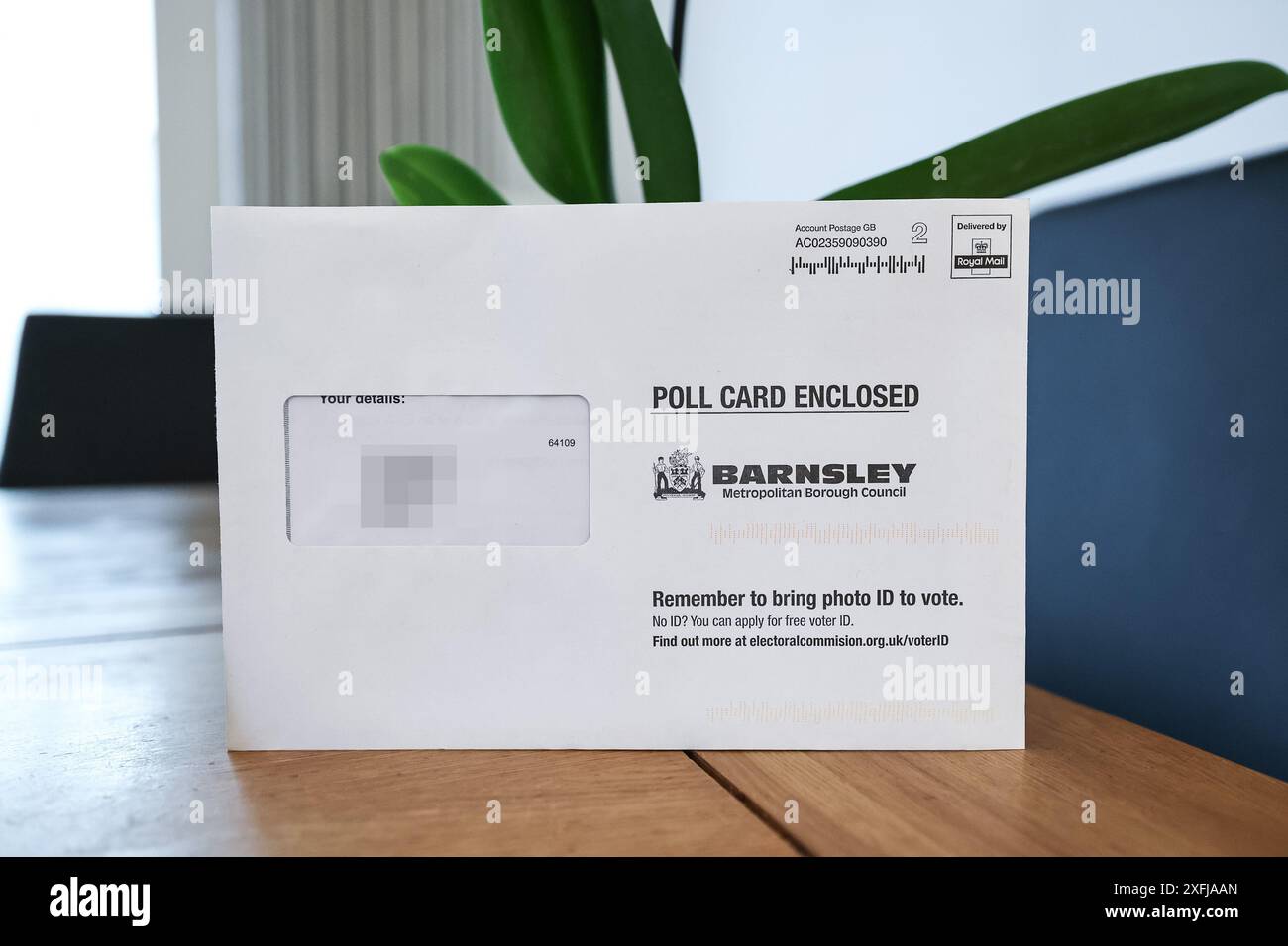 A Barnsley Metropolitan Borough Council poll card letter with a ...