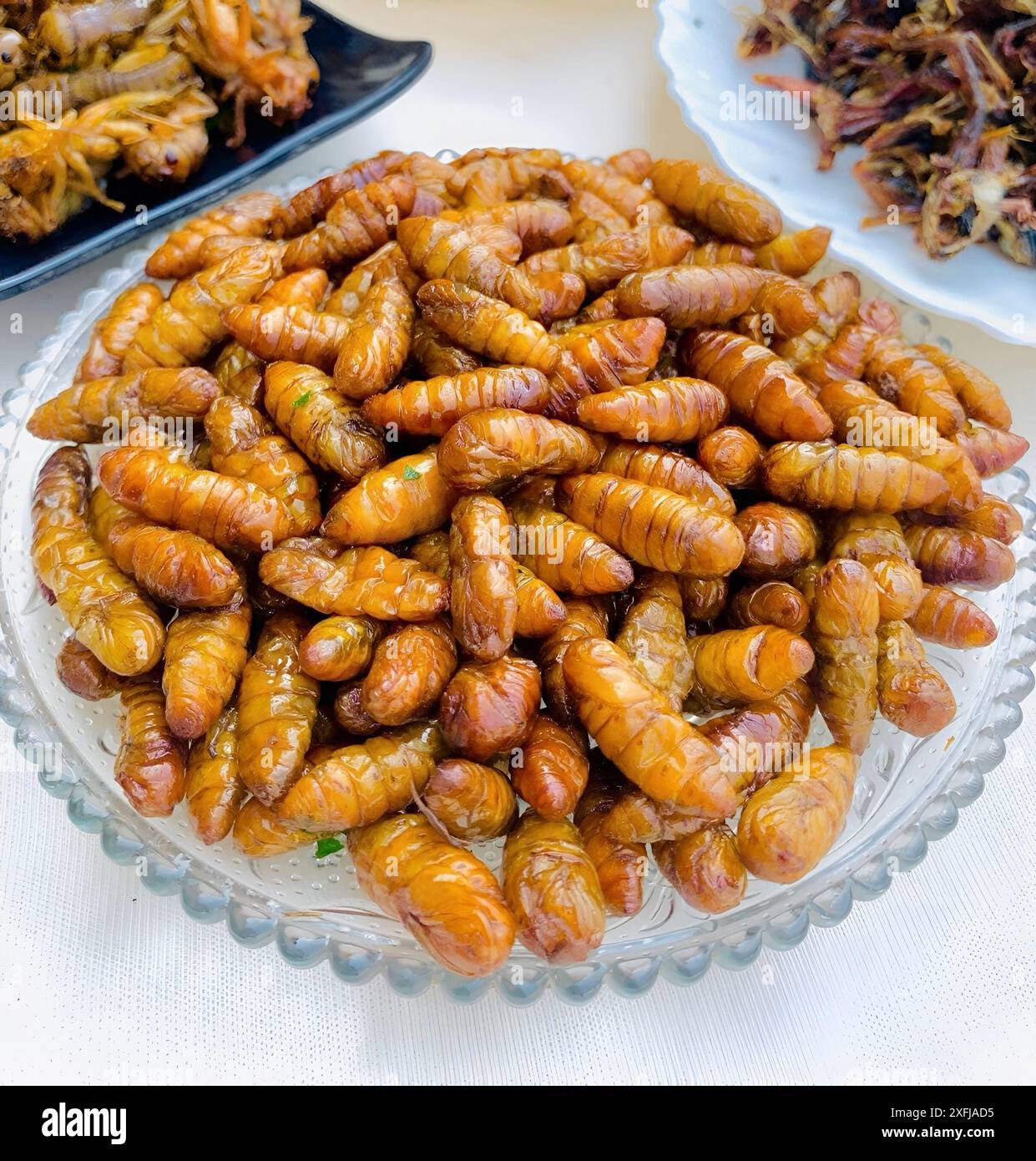 Silkworm pupae as food hi-res stock photography and images - Alamy