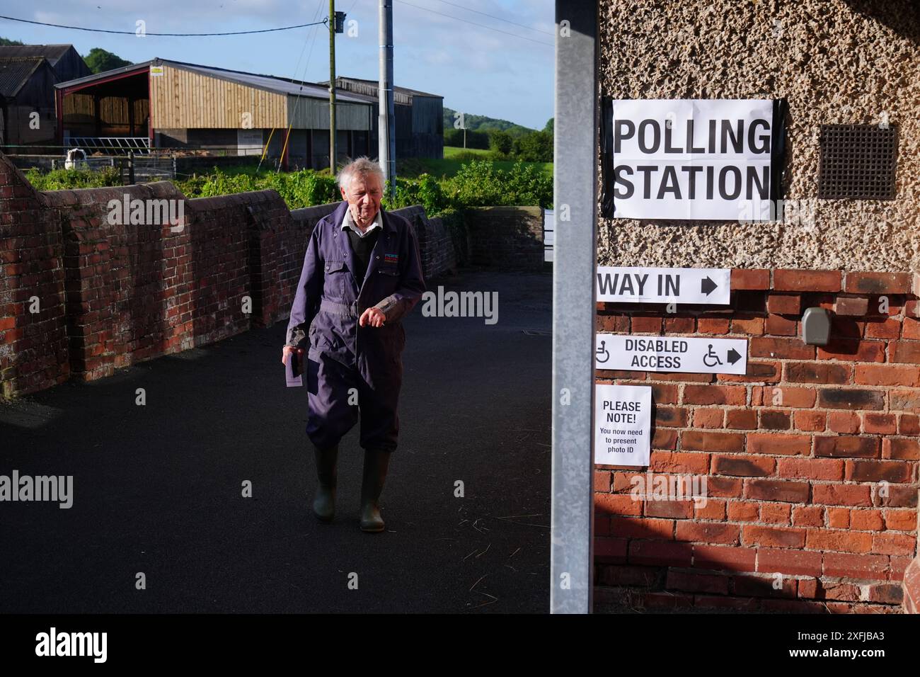 A voter arrives to cast their vote in the 2024 General Election at ...