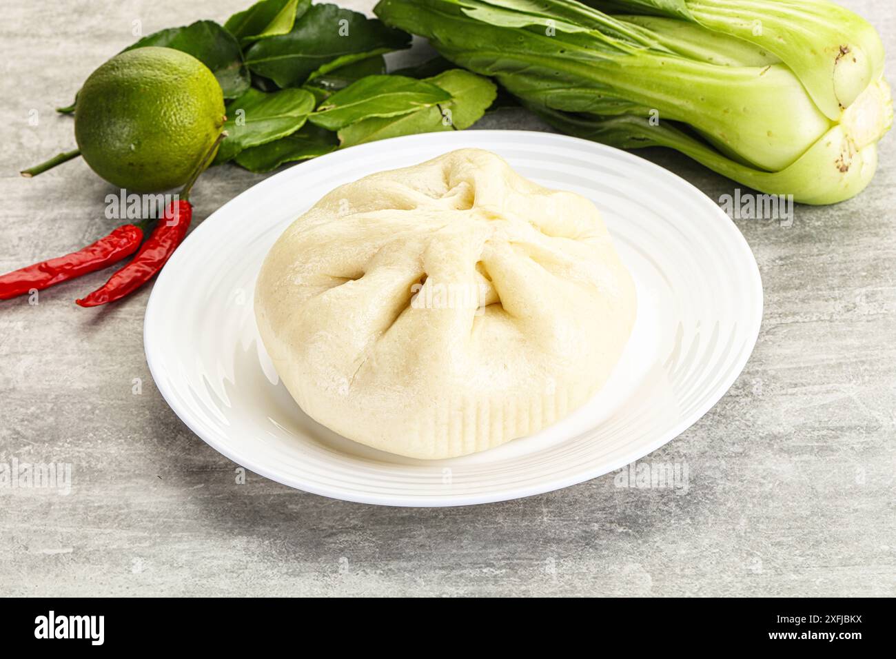Chinese steamed bun Dim sum with meat Stock Photo - Alamy