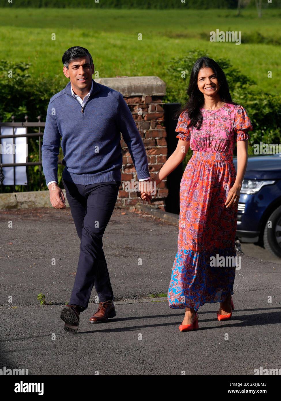 Prime Minister Rishi Sunak and his wife Akshata Murty arrive to cast ...