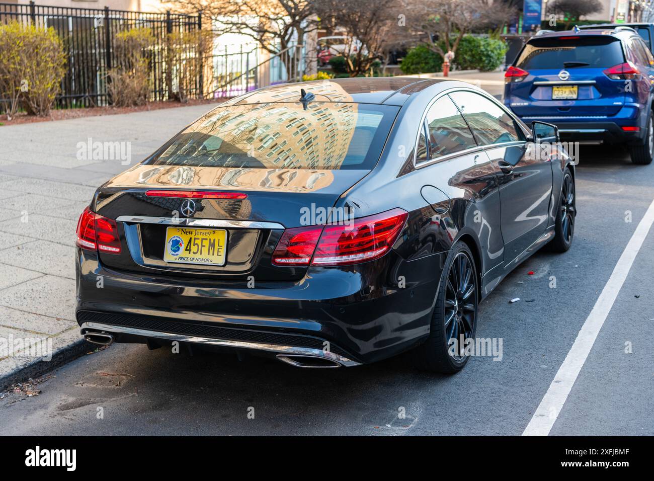 New York City, USA - March 15, 2024: 2014 Mercedes Benz E550 luxury car ...