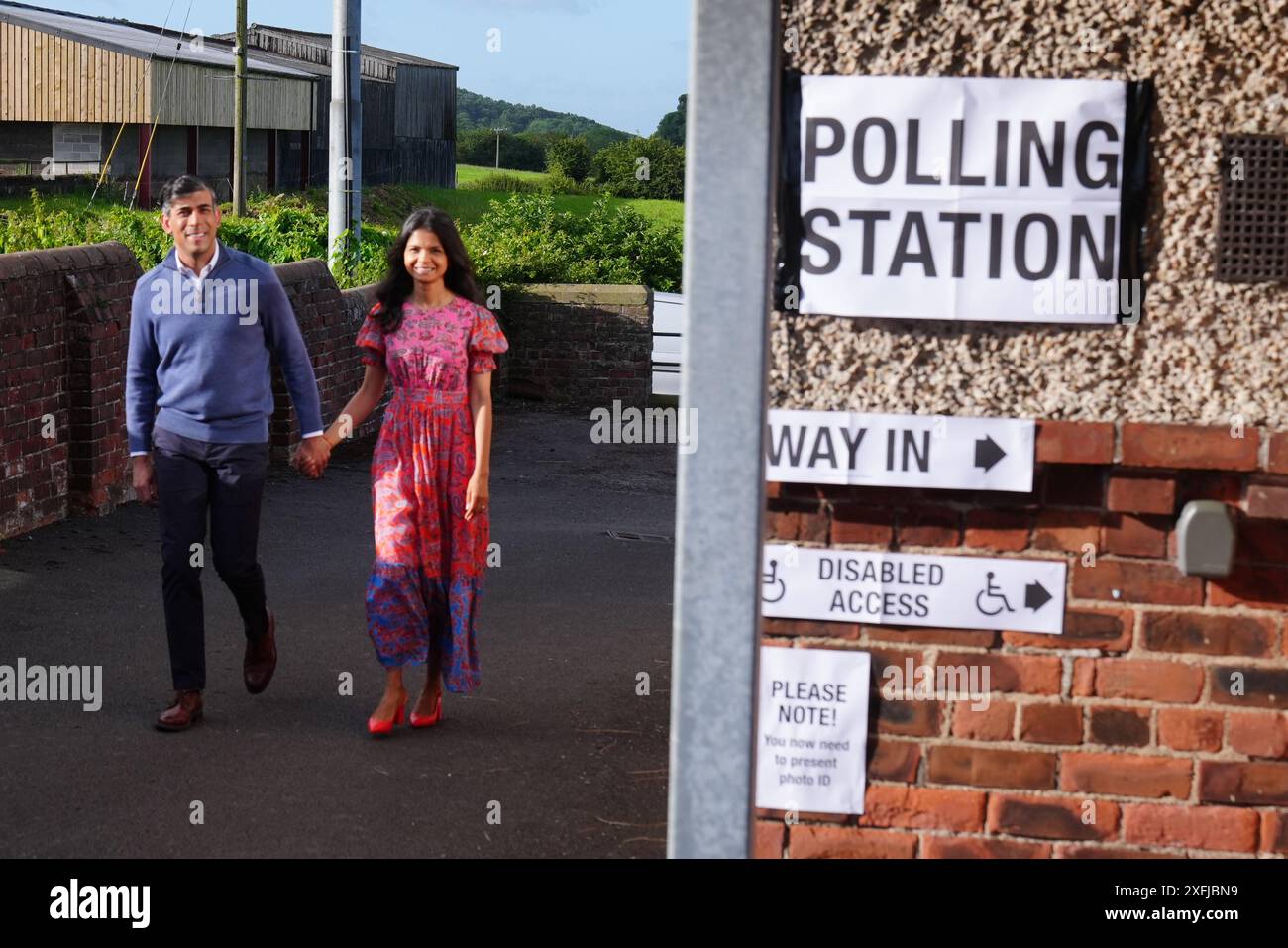 Prime Minister Rishi Sunak and his wife, Akshata Murty, arrive to cast their vote in the 2024 ...