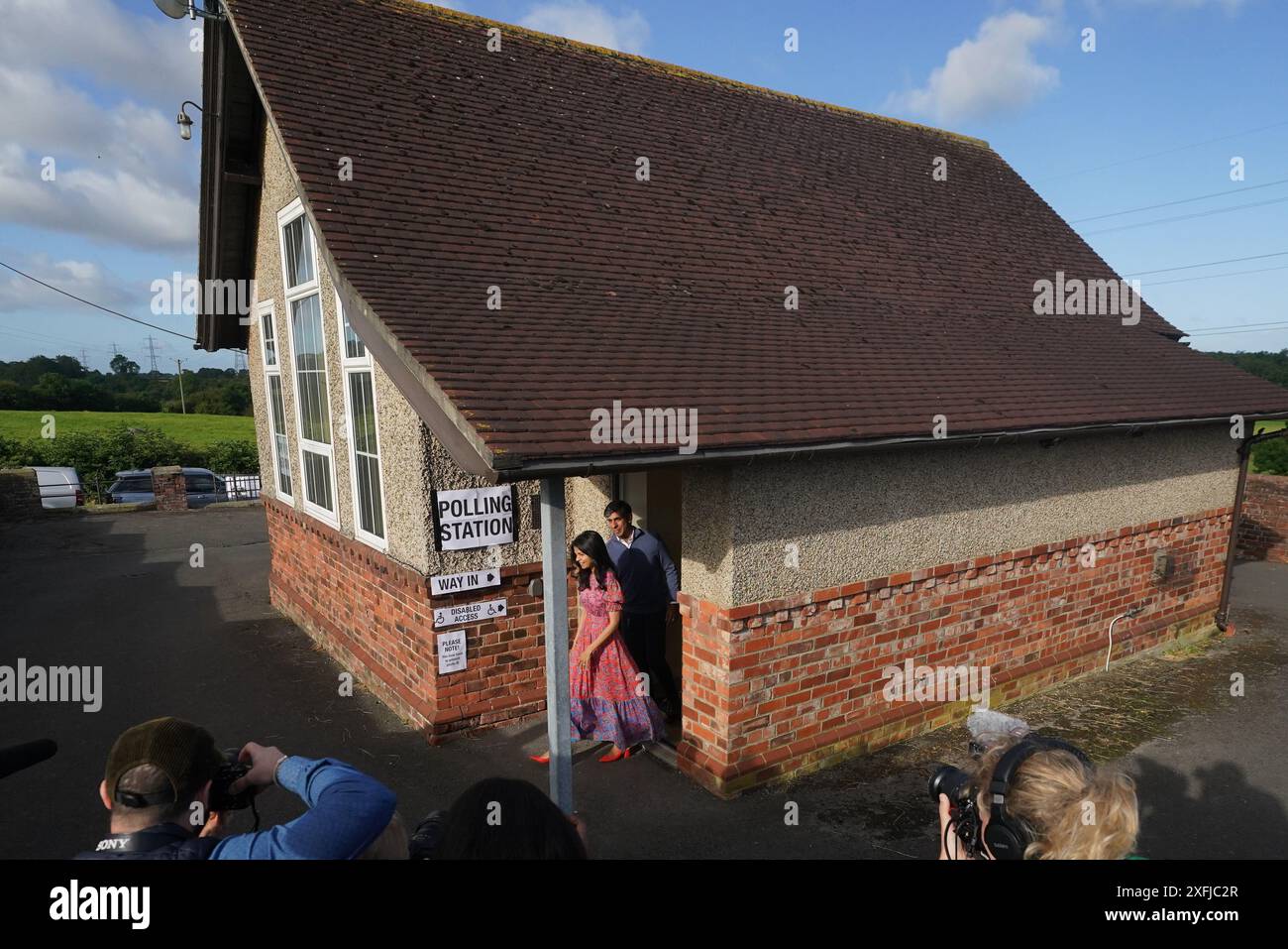 Prime Minister Rishi Sunak and his wife, Akshata Murty, leave after casting their vote in the ...