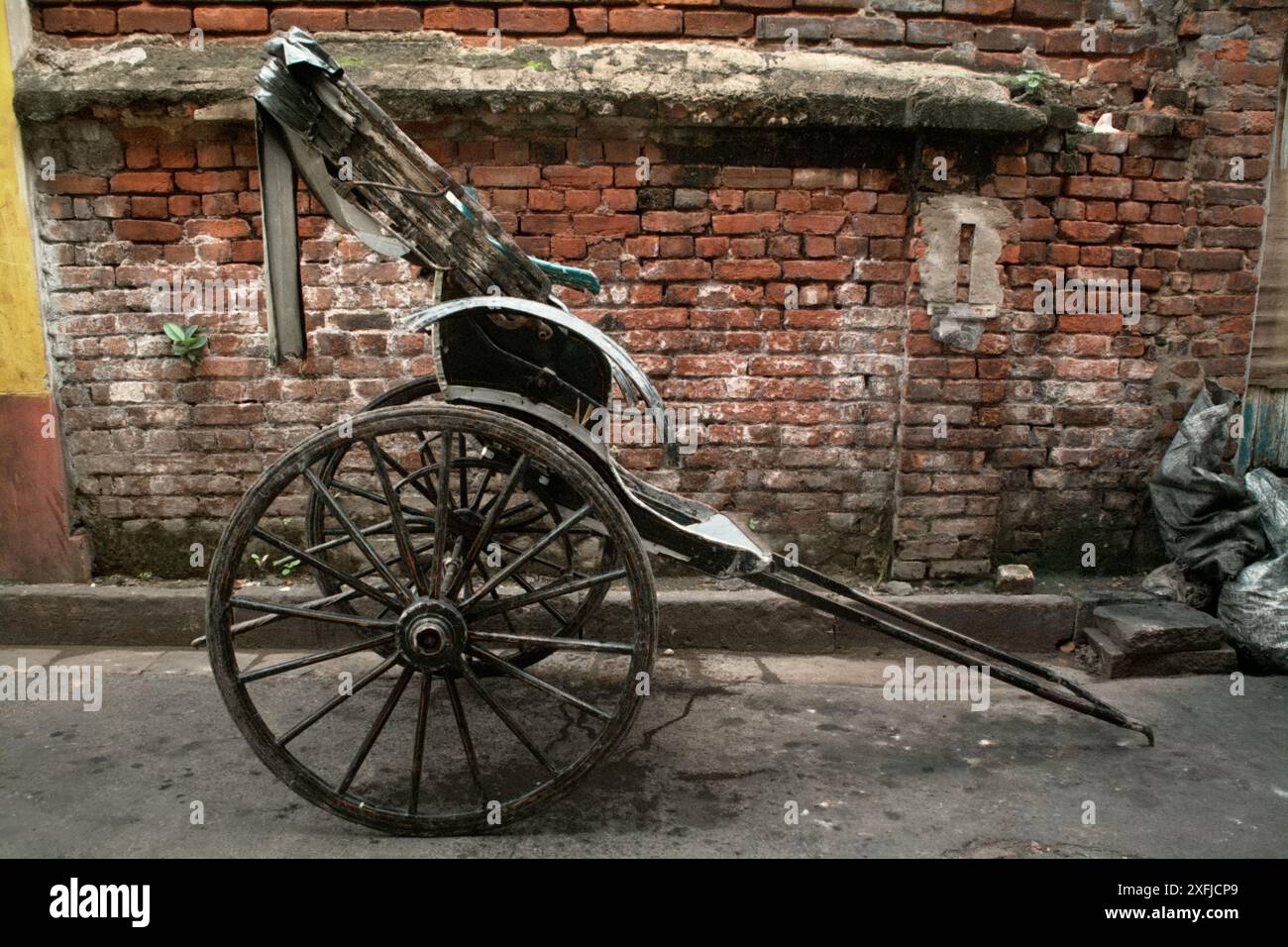A hand-pulled rickshaw in Kolkata, West Bengal, India Stock Photo - Alamy