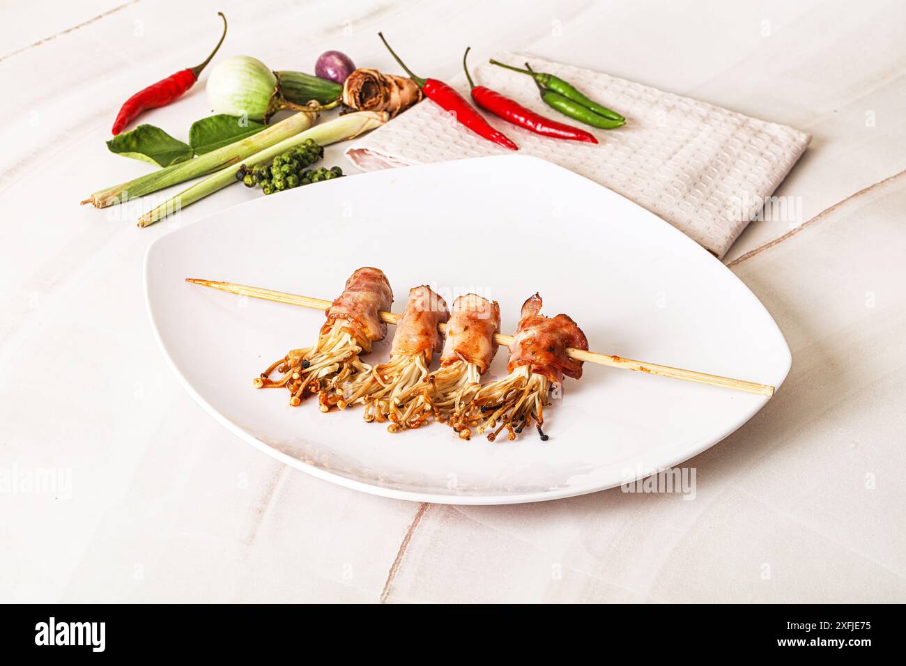 Thai Street foof satay with bacon and mushroom enoki skewer Stock Photo ...