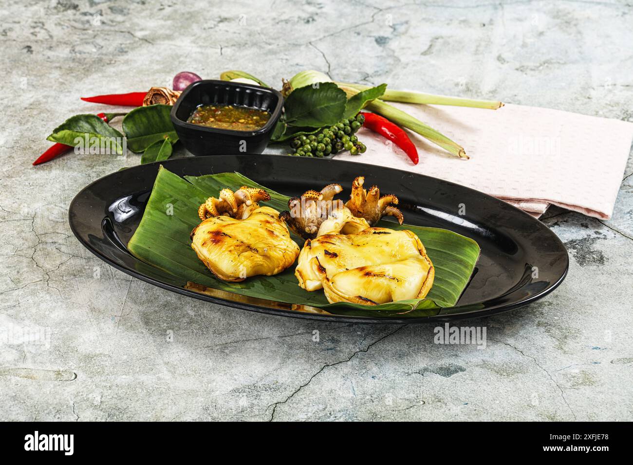 Delicous Grilled cuttlefish with sauce asian style Stock Photo - Alamy