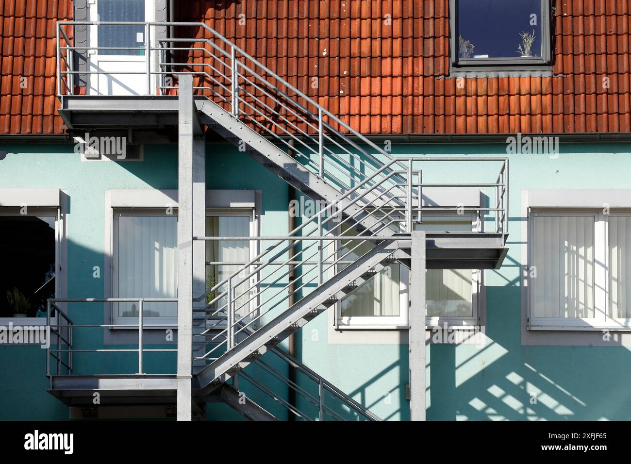 External steel staircase on a residential building, Germany Stock Photo ...
