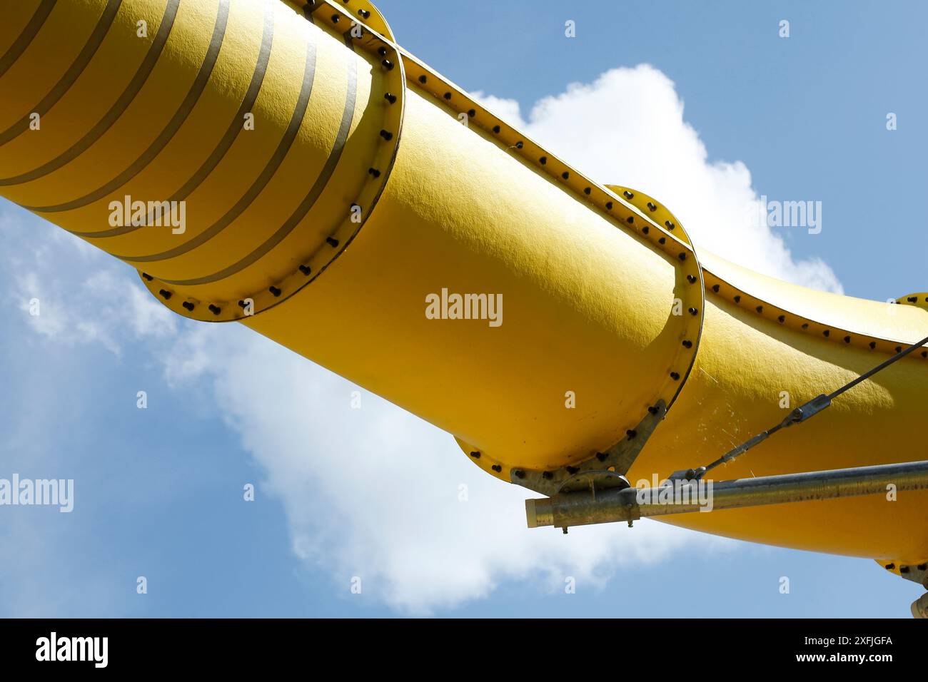 Yellow water slide in a swimming pool, Starnberg, Upper Bavaria ...