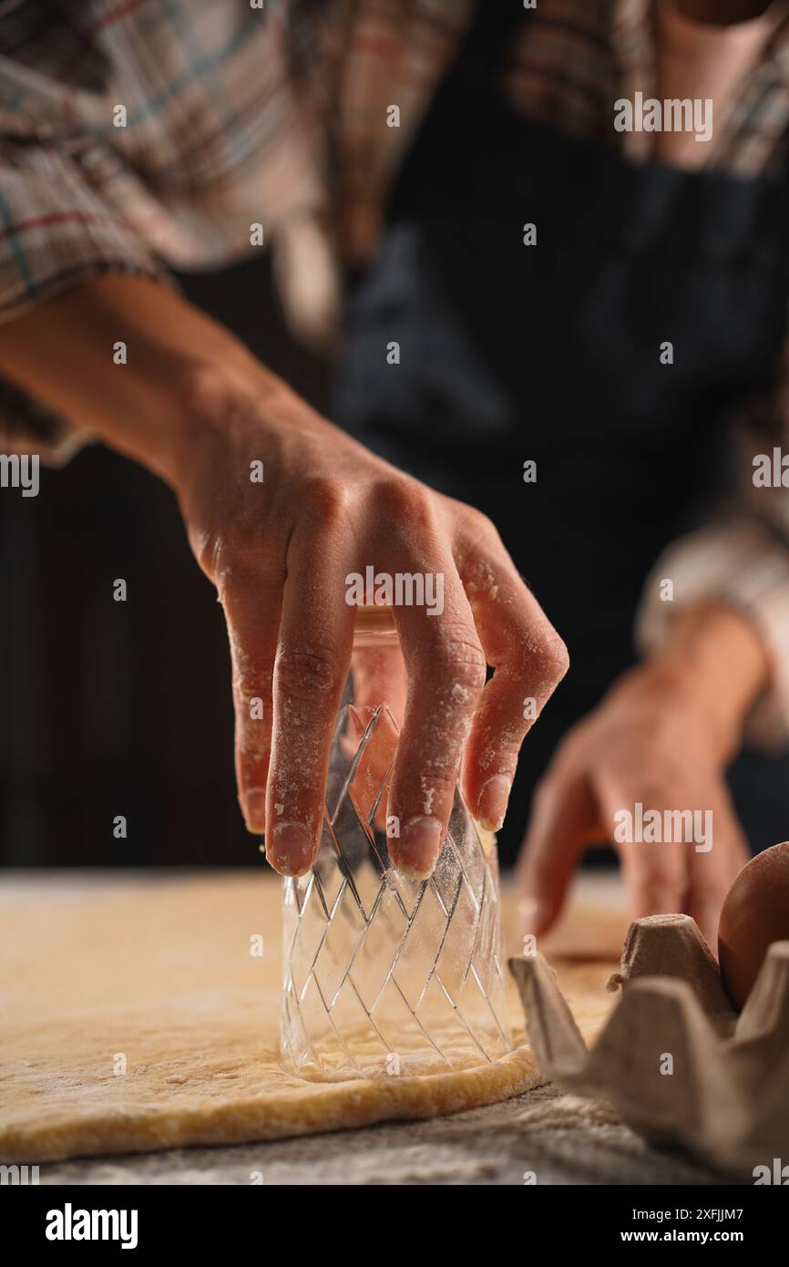 Chef's Hands Cutting Dough Circles with Glass for Dumplings Stock Photo ...