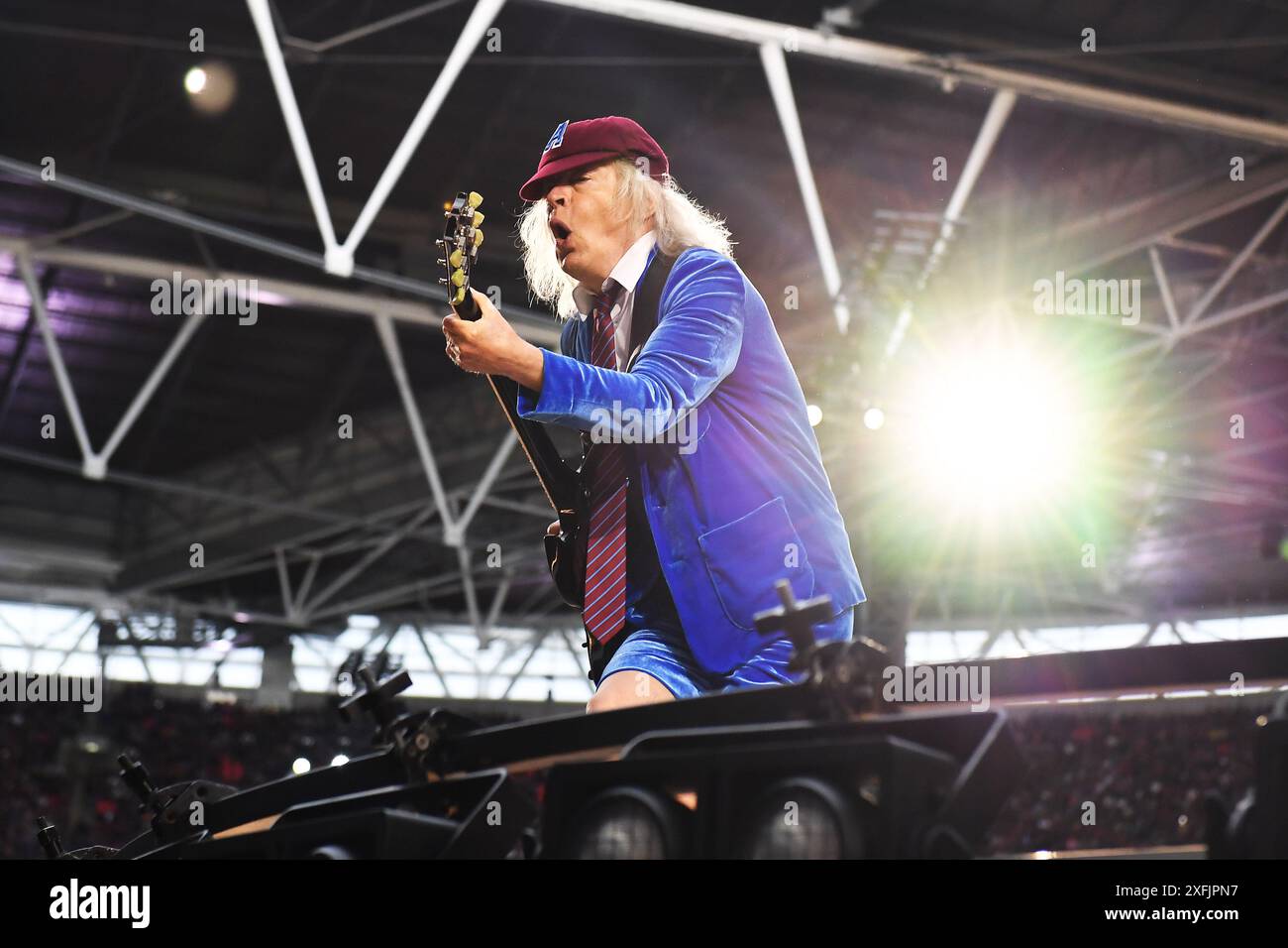 LONDON, ENGLAND - JULY 03: Angus Young of ‘AC/DC’ performing at Wembley ...