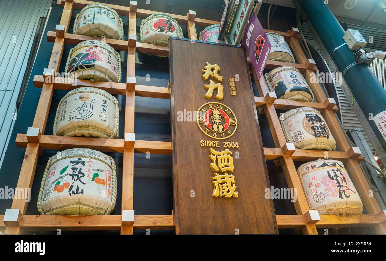 Osaka, Japan Tenma district, Sake shop bottles barrles Stock Photo - Alamy