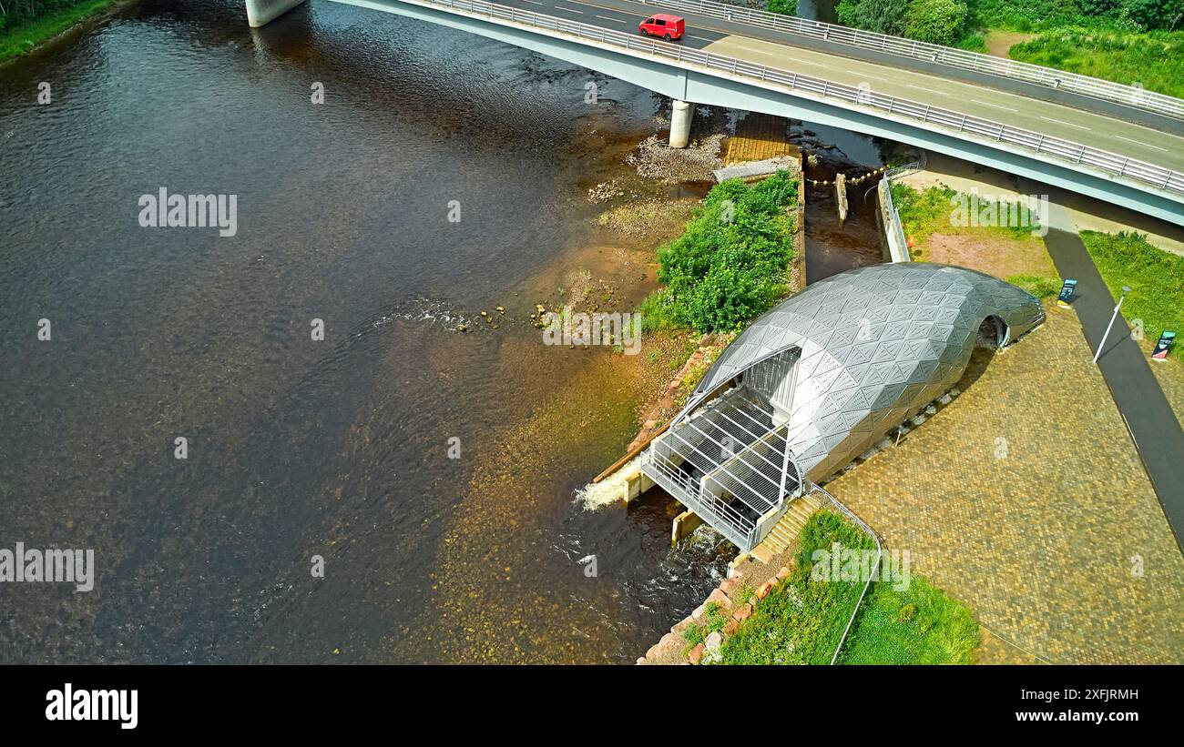 Hydro Ness the silver steel hydroelectric generator on the banks of ...
