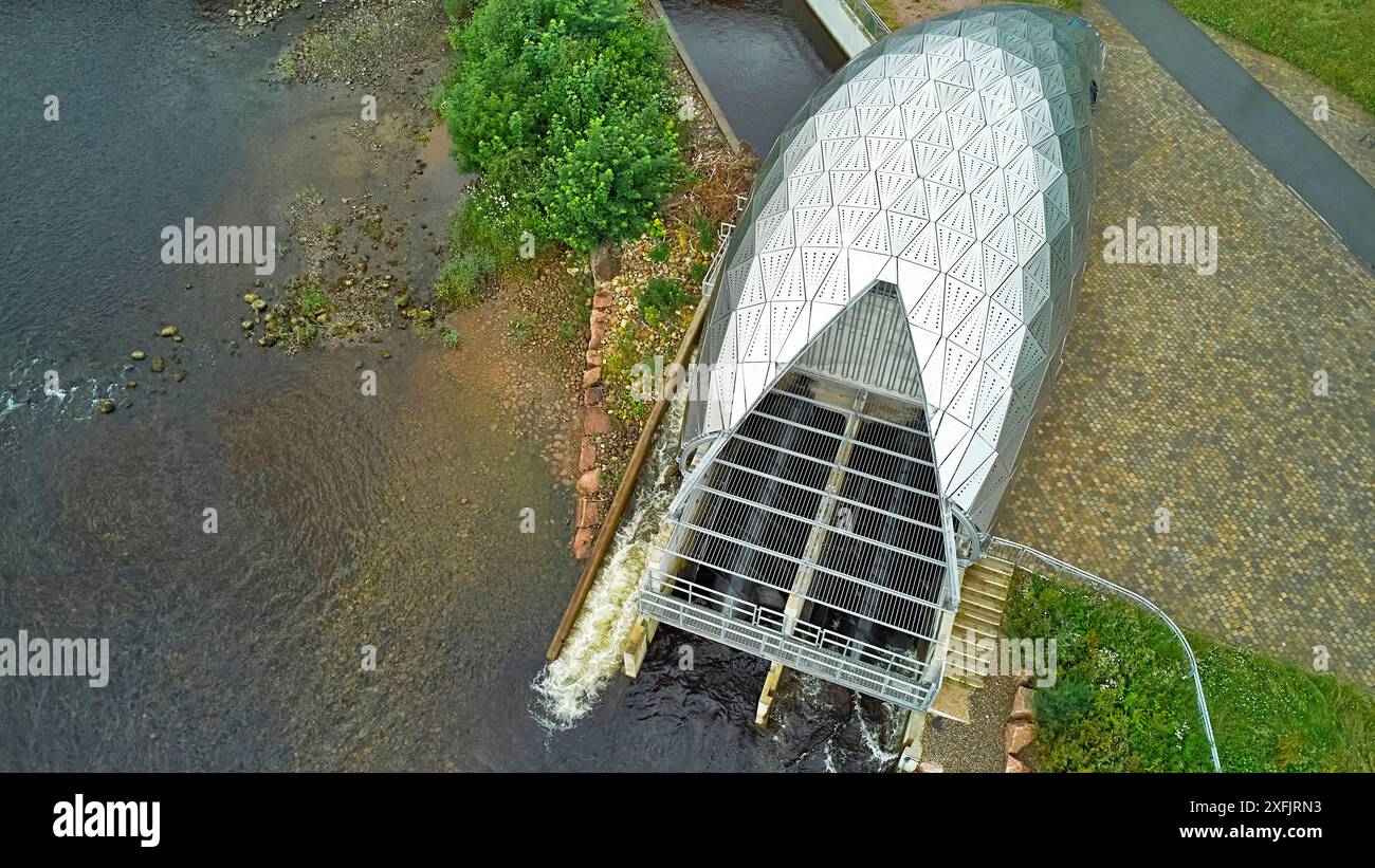 Hydro Ness the silver steel hydroelectric generator on the banks of ...