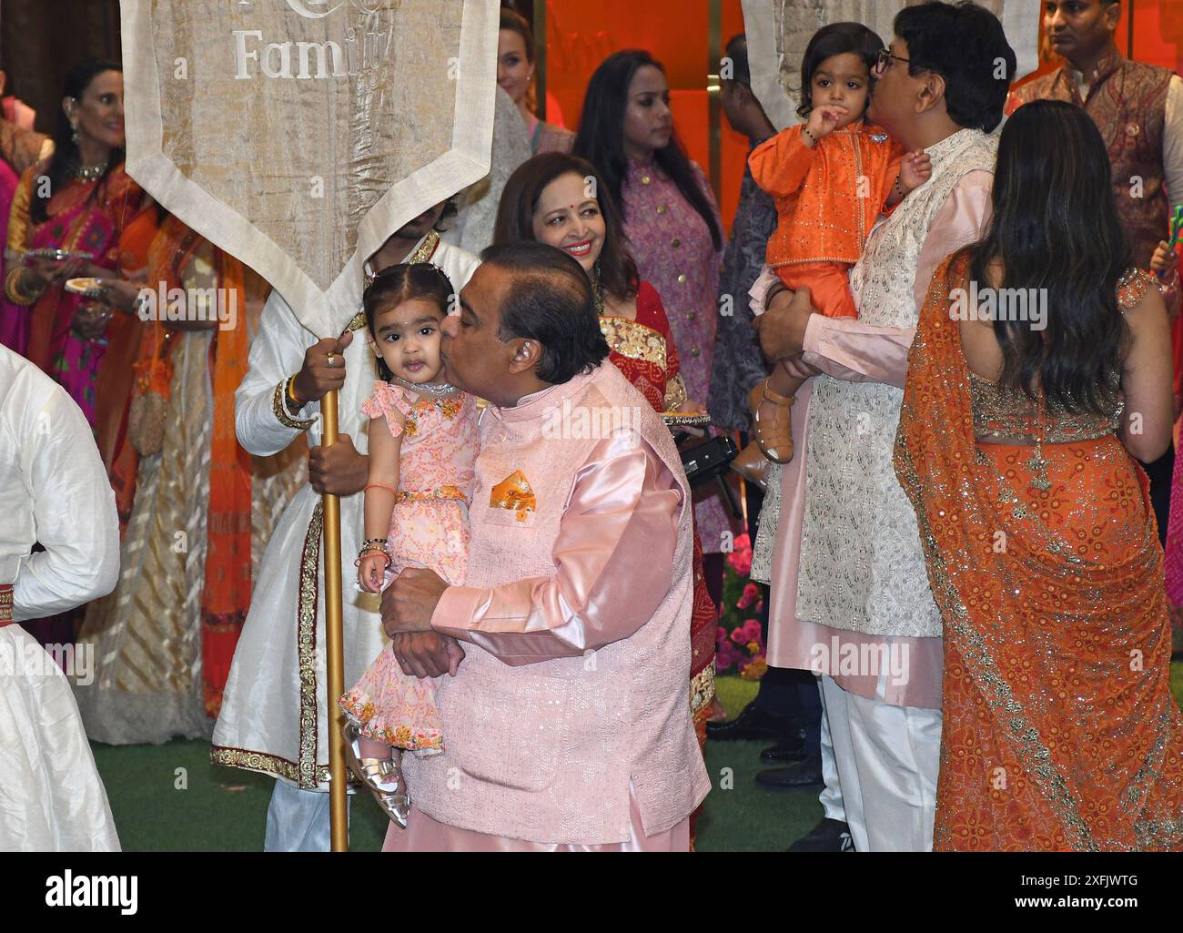 Indian businessman Mukesh Ambani kiss his granddaughter at the 'Mameru ...
