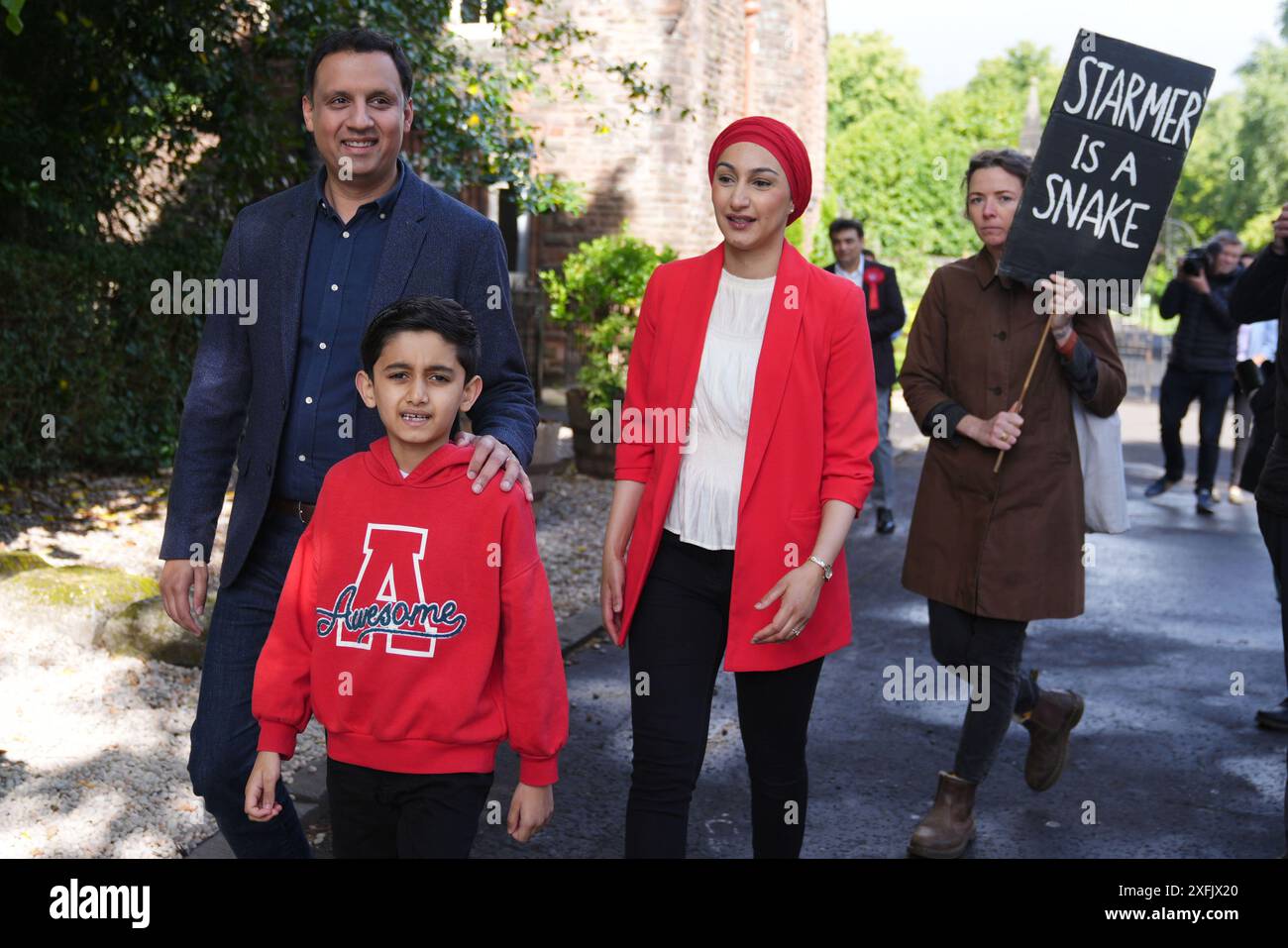 Scottish Labour leader Anas Sarwar with his wife Furheen, and son ...