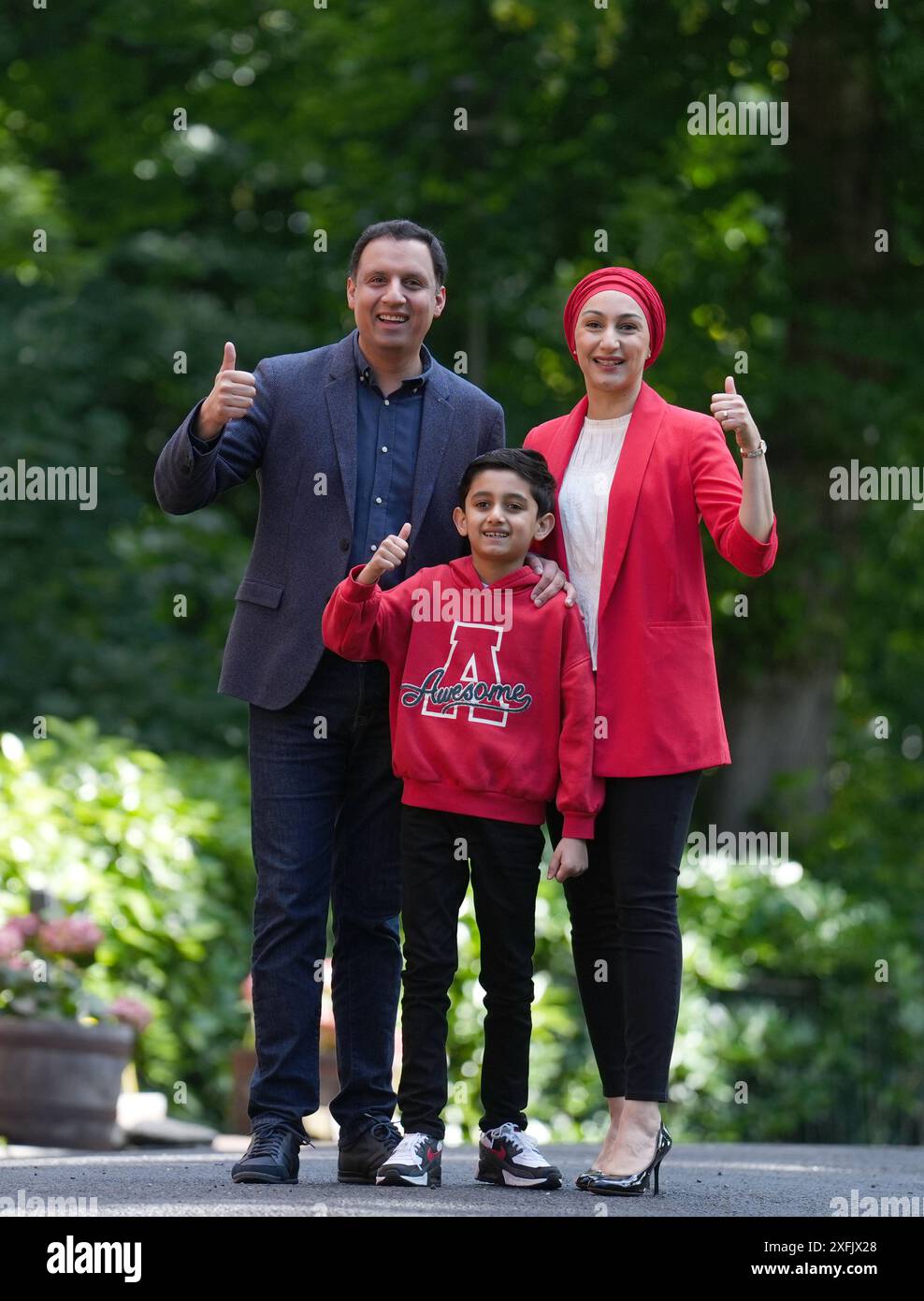 Scottish Labour leader Anas Sarwar with his wife Furheen, and son ...