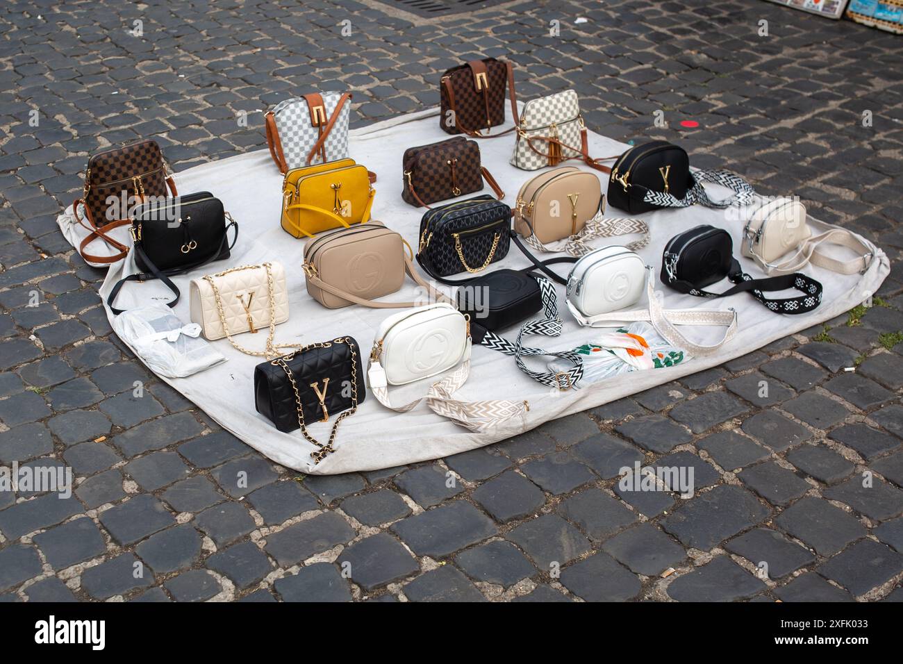 Rome, Italy - June 29, 2024: Counterfeit handbags and purses for sale ...