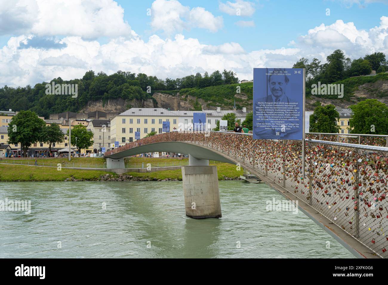 Salzburg, Austria. June 30, 2024. a Salzach river bridge covered with ...