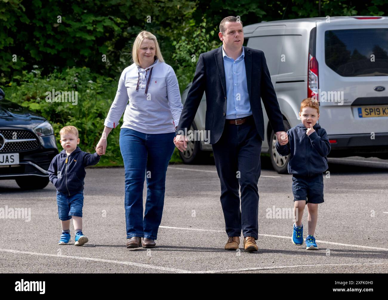 Scottish Conservative leader Douglas Ross arrives with his family to ...