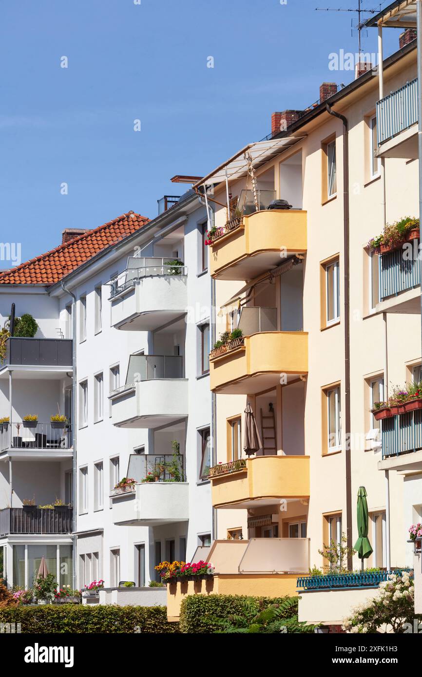 Monotonous house facades with balconies on residential buildings ...