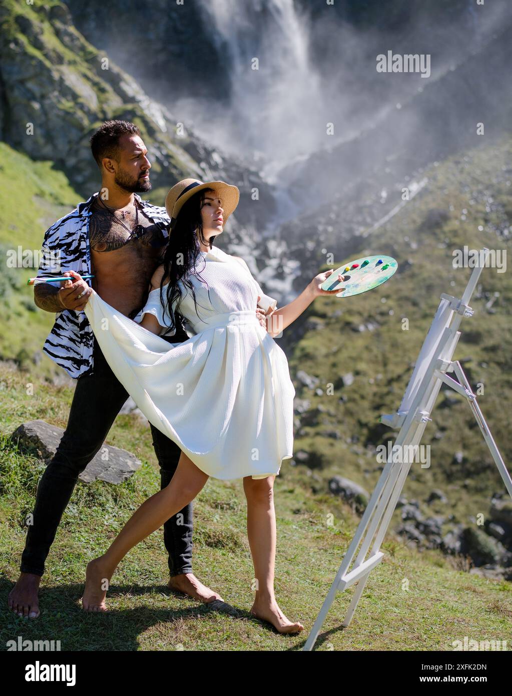 Art couple in love together on nature background. Artist couple in love ...