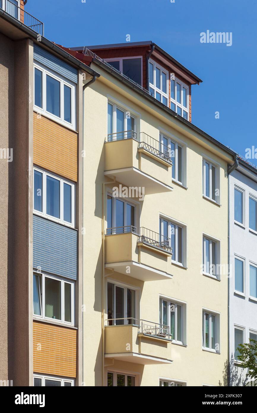 Monotonous house facades with balconies on residential buildings ...