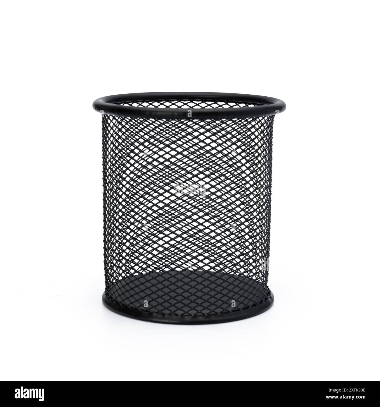 Isolated black metal pen holder standing on white surface. cylinder ...